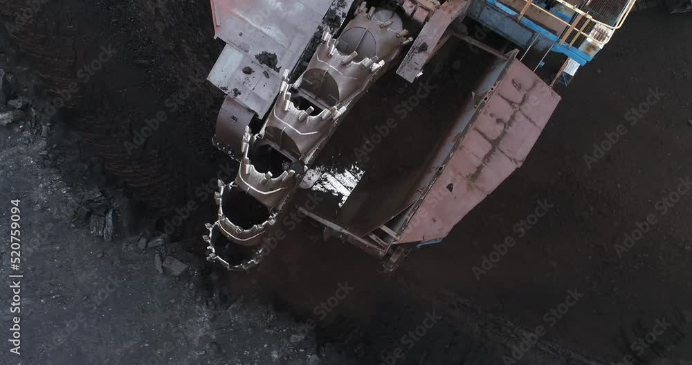 Huge industrial machine. Giant rotary bucket. Coal mining. Mining ...
