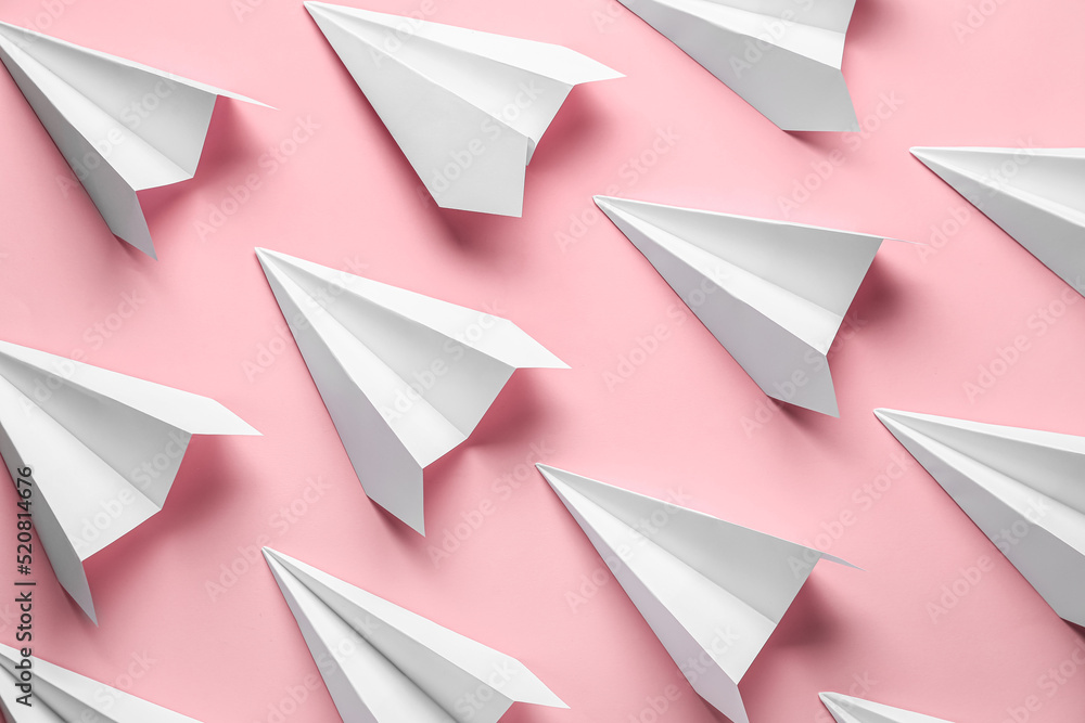 Paper planes on pink background Stock Photo | Adobe Stock