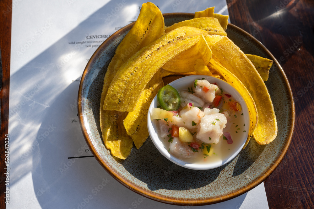 Ceviche y platano frito fusión. Stock Photo | Adobe Stock