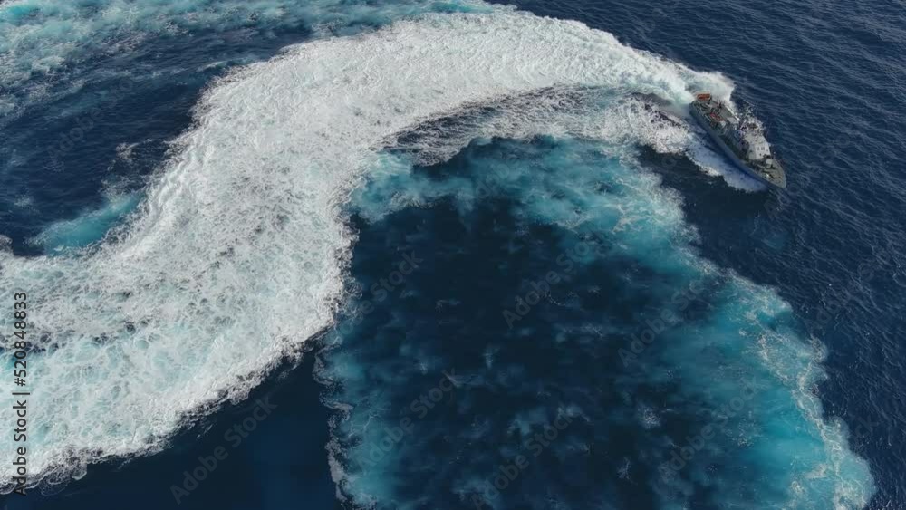Navy warship in action Full power speed Performing maneuvers, aerial ...