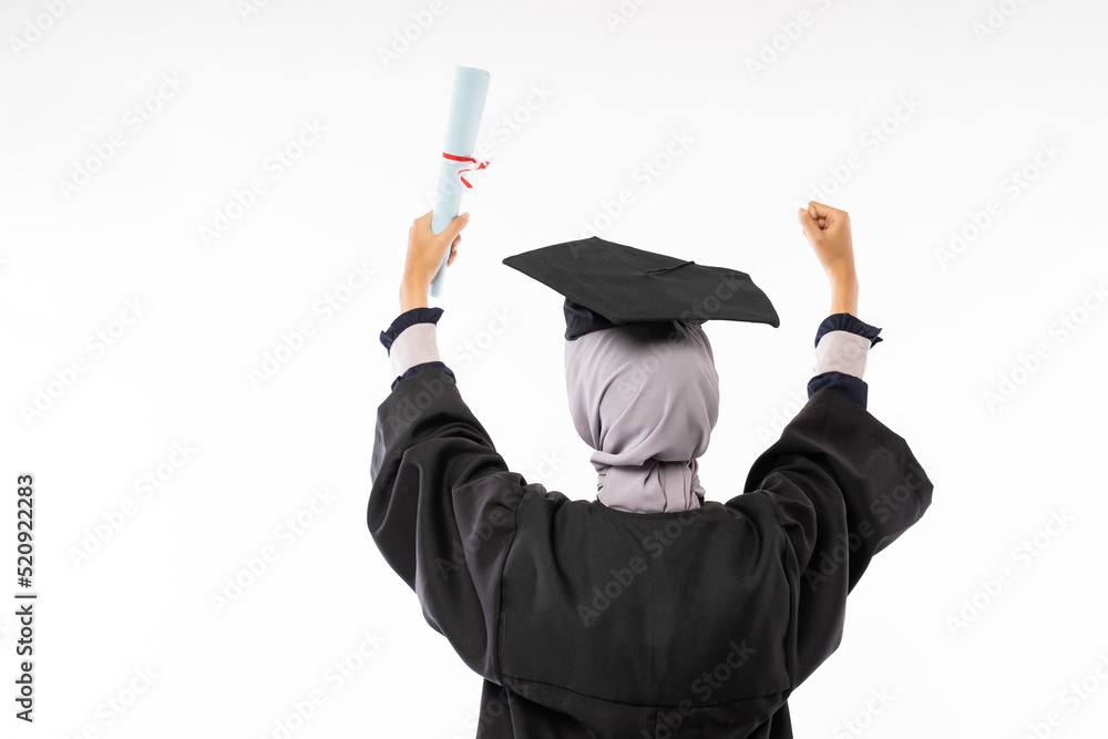 Rear behind view photo of female college graduate wearing toga holding ...