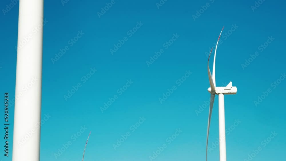 wind power generation. Renewable Green energy. Rotating propellers. The ...