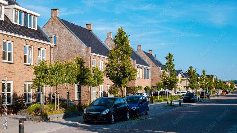 Dutch Suburban area with modern family houses, newly build modern ...