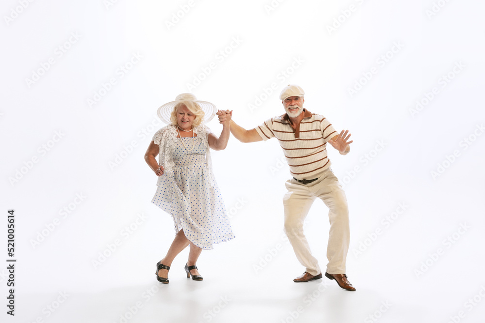 Portrait of retro style dancers, senior man and woman in vintage attire ...