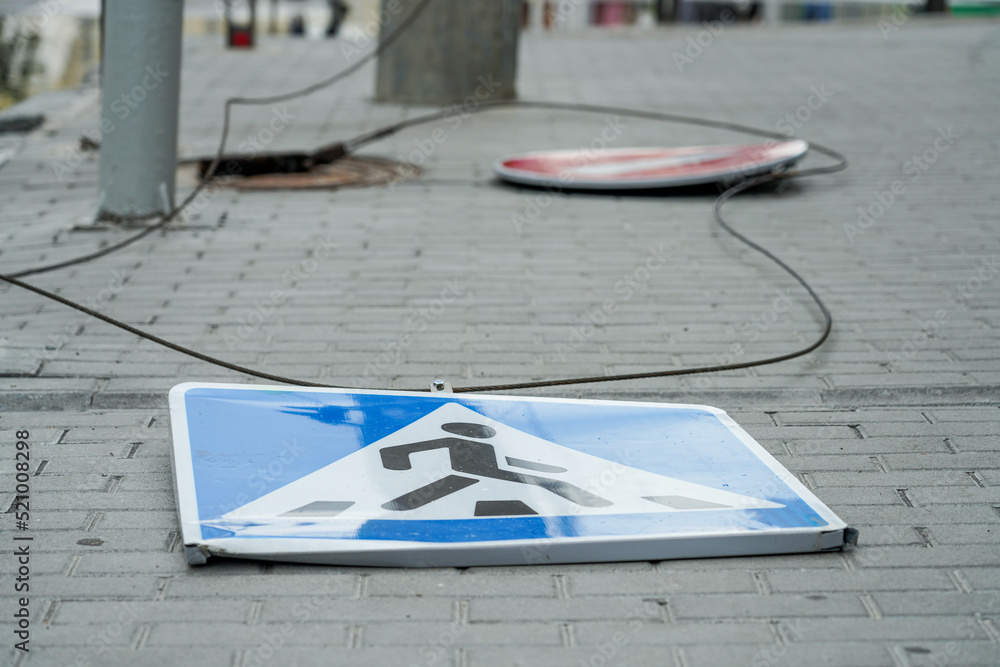 The road sign has fallen. The road sign is broken. Road. No travel ...