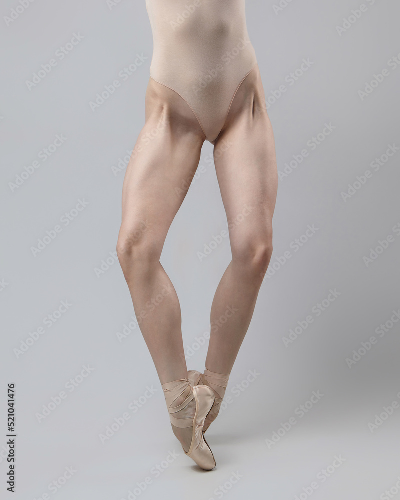 ballerina's legs in close-up. photo shoot in the studio on a white ...