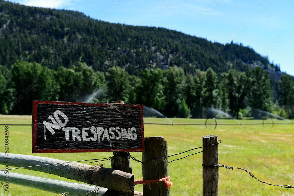 Poster An old wooden No Trespassing sign made with black and red paint ...