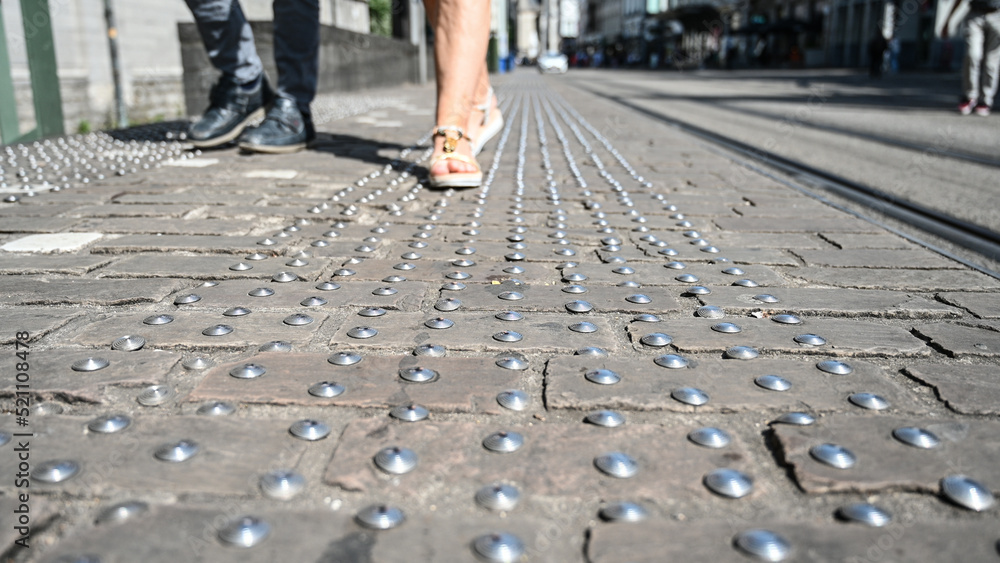 Tactile paving on sidewalk in the city. Tactile blister concrete blocks ...
