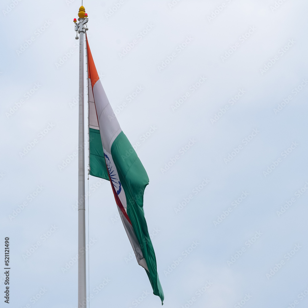 India flag flying high at Connaught Place with pride in blue sky, India ...