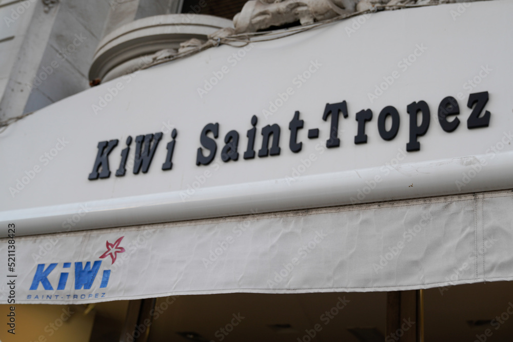 Kiwi Saint-Tropez logo text and sign brand front wall facade shop of ...