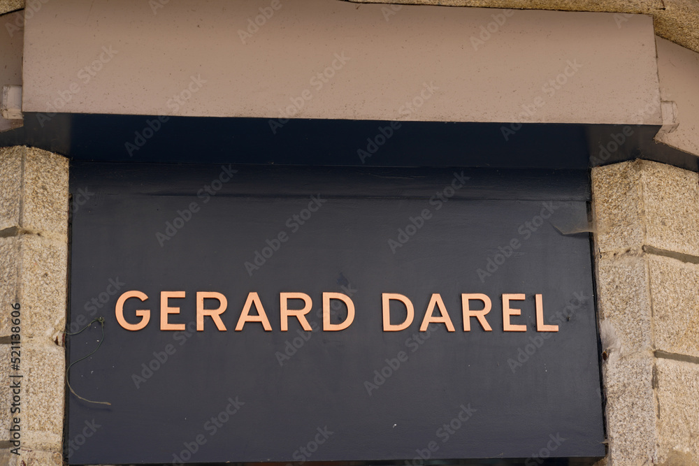Gerard Darel logo brand and sign text front facade store fashion brand ...