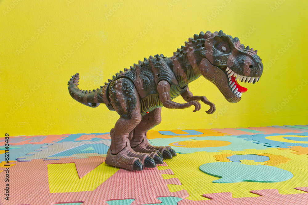 Tyrannosaurus T-rex, plastic toy, dinosaur with milkshake isolated on ...