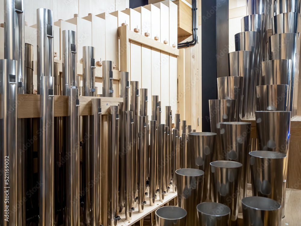 Inside a contemporary organ in modern philharmonic hall, register with ...