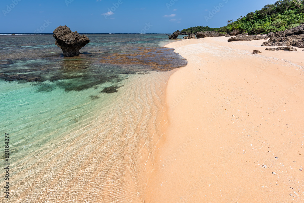 Incredible crystal clear sea waters with glistening surface, wavy sands ...