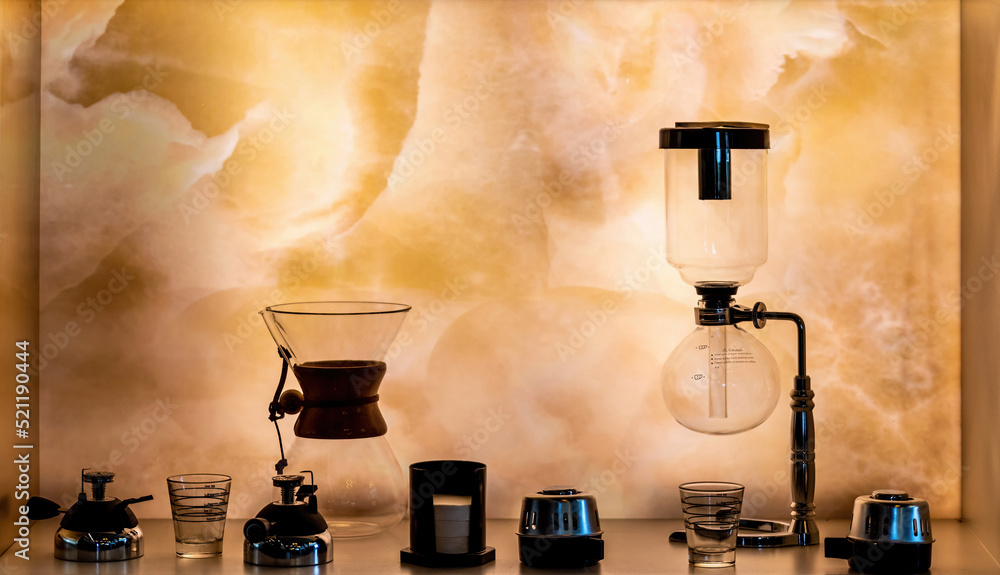 Alternative third generation coffee brewing equipments standing on the ...