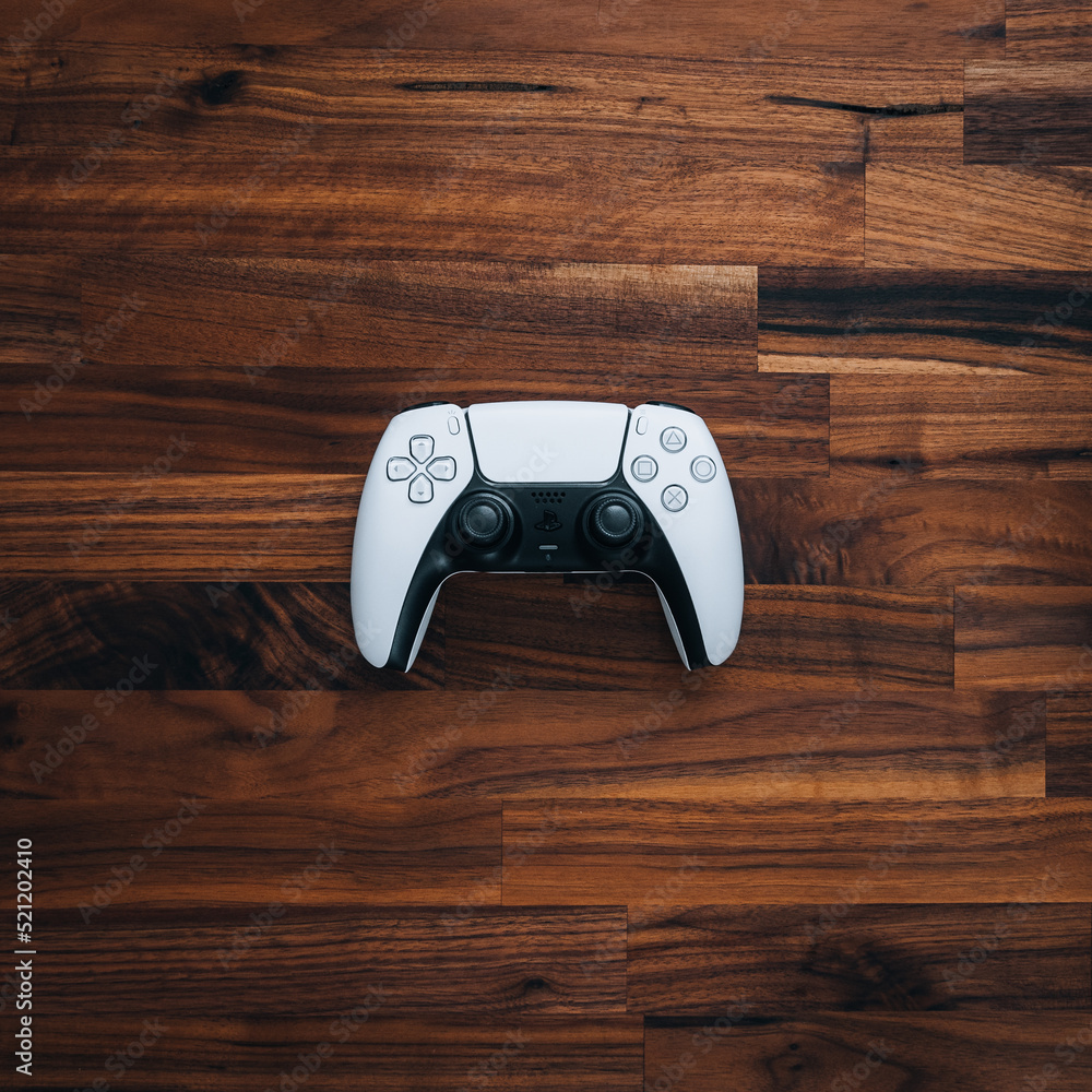 LONDON - AUGUST 3, 2022: PlayStation 5 video games PS5 controller on ...