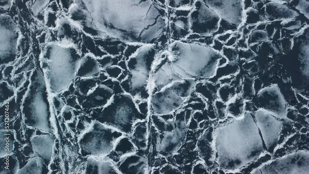 Drone top down Grandiose melting of spring sharp ice floes float on ...