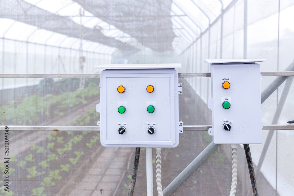 Control box water timer in organic farm at greenhouse. Electric pipe ...