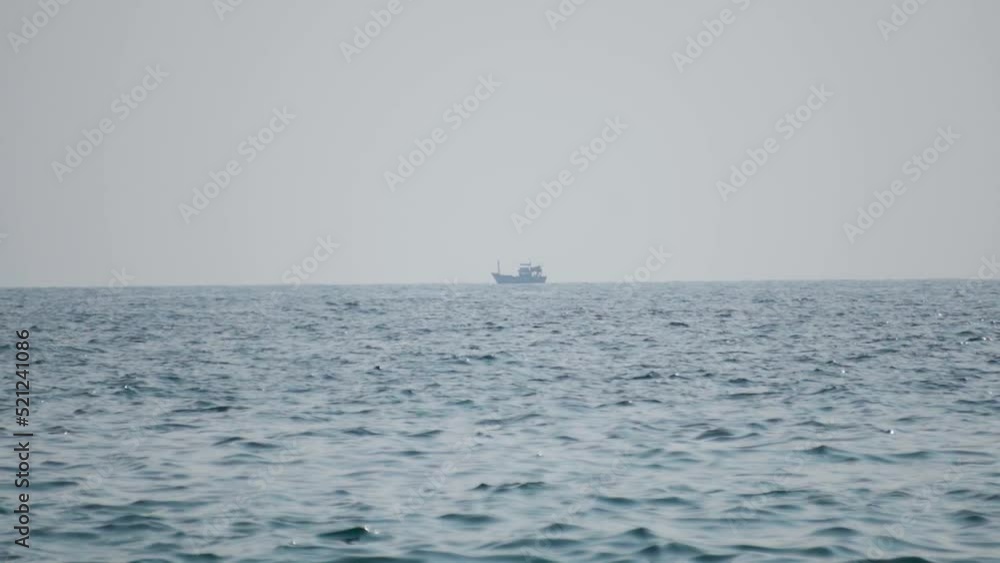 Minimalistic shot of boat in the big ocean. Boat in the sea background ...
