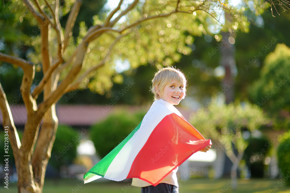 Cute little child holding big Italian flag sunny summer day outdoors ...
