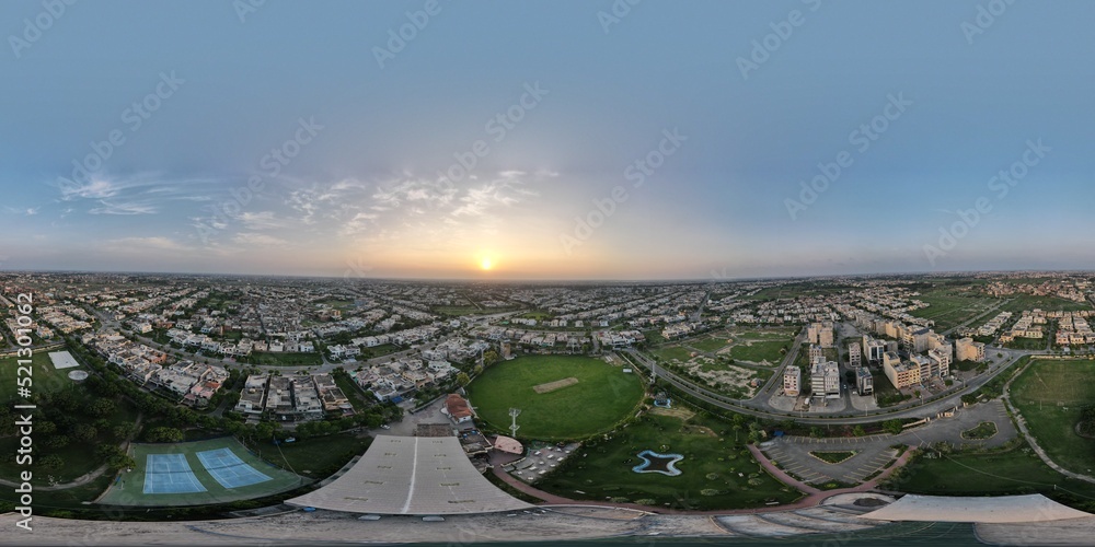 An aerial view (360-degree panorama) of a housing society and its ...