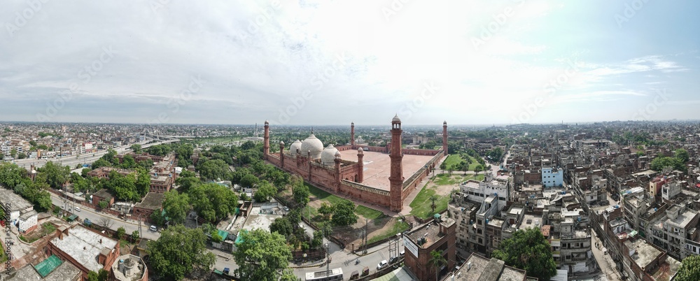 An aerial 180-degree panorama of historic Badshahi Mosque, Minar-e ...