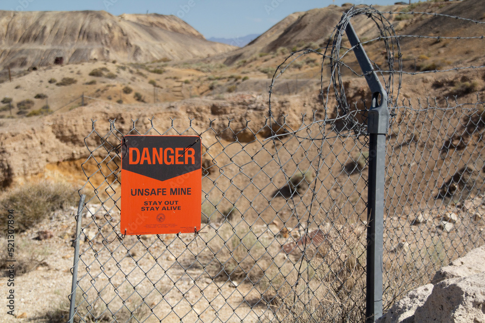 Mine Warning Sign with Cut or Broken Fence Stock Photo | Adobe Stock
