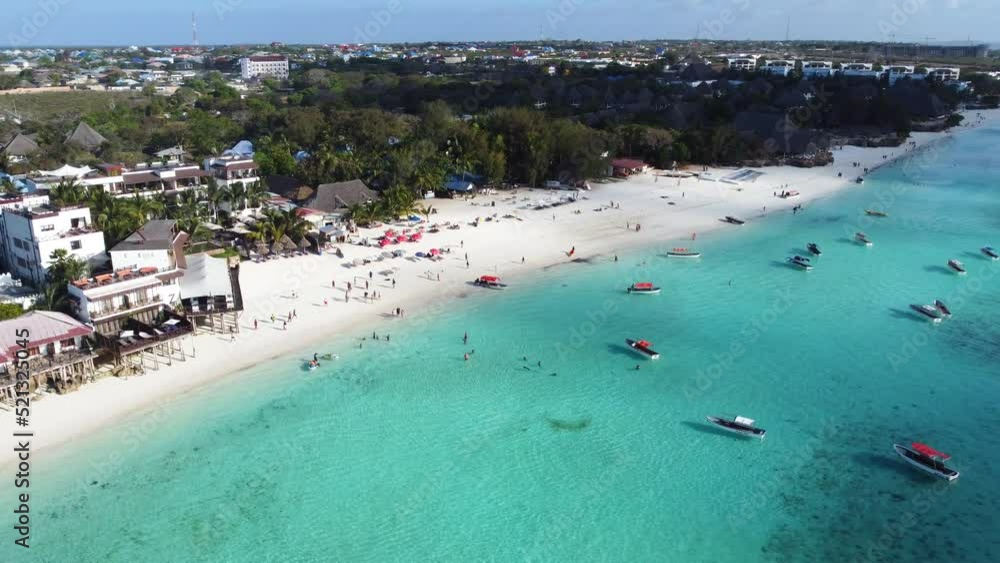 A stunning aerial view of Nungwi beach and Nungwi town with a lot of ...
