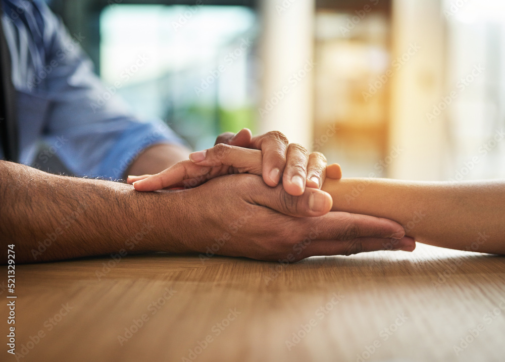 Hands holding together with love, support and care in a touching and ...