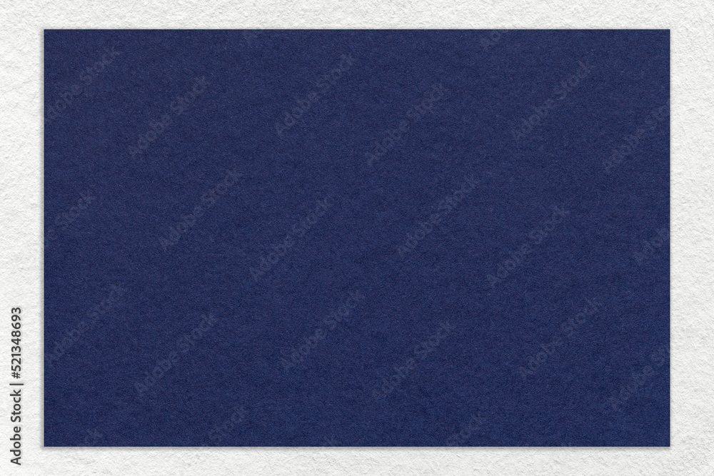 Texture of craft navy blue color paper background with white border ...