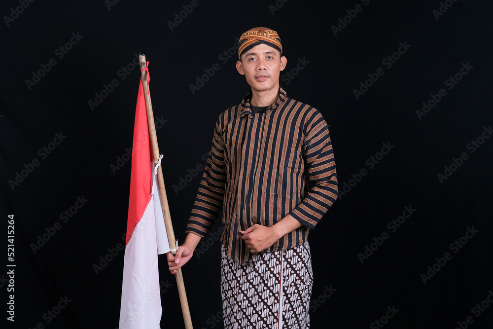 Men wearing traditional Javanese batik clothes to show the richness of ...