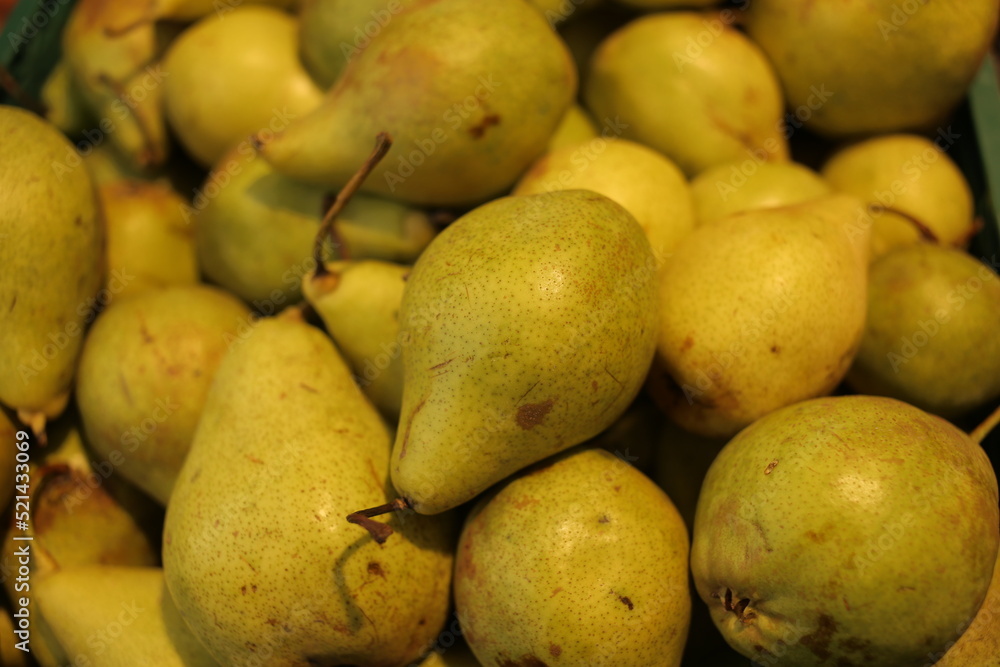 pear background. a lot of pears in a supermarket on a shelf, top view ...