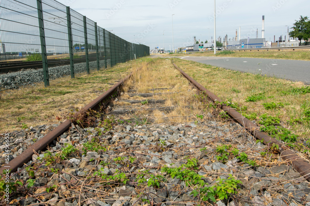 old rusted rail on a railroad that is no longer in service and ...