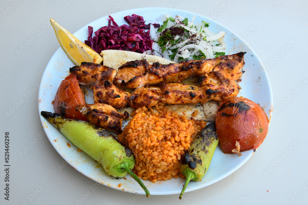 Chicken wings barbeque in a dish with BBQ grill sauce . Izgara tavuk ...