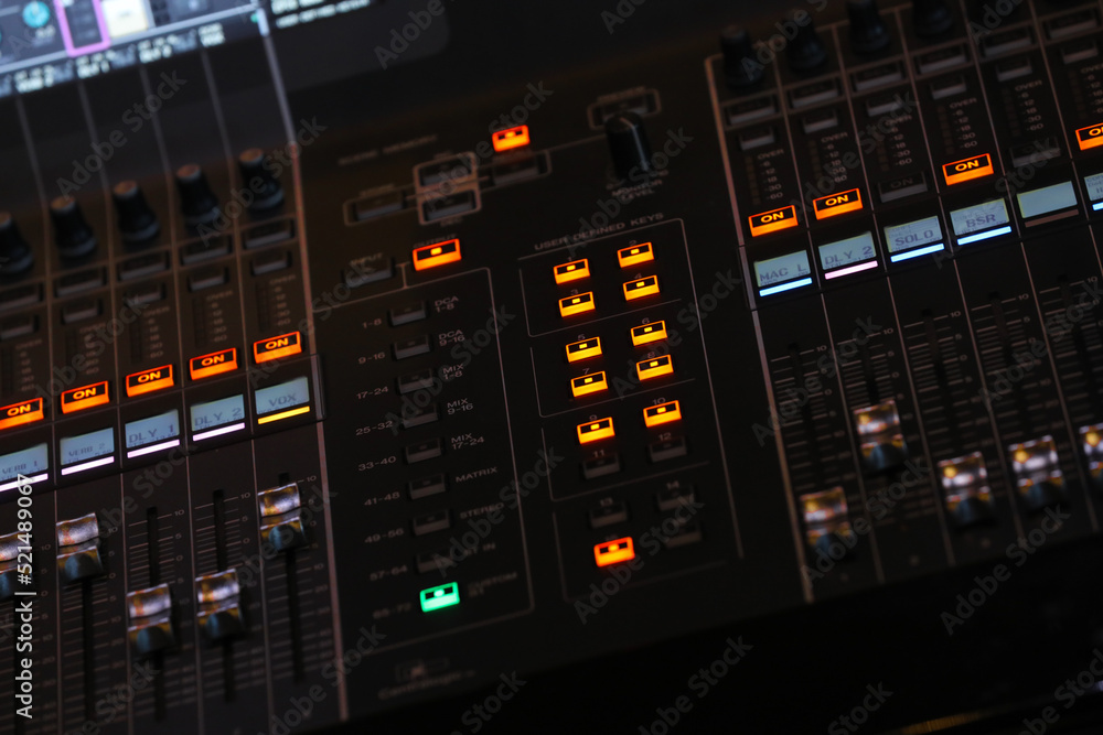 Professional sound and audio mixer control panel with buttons and ...