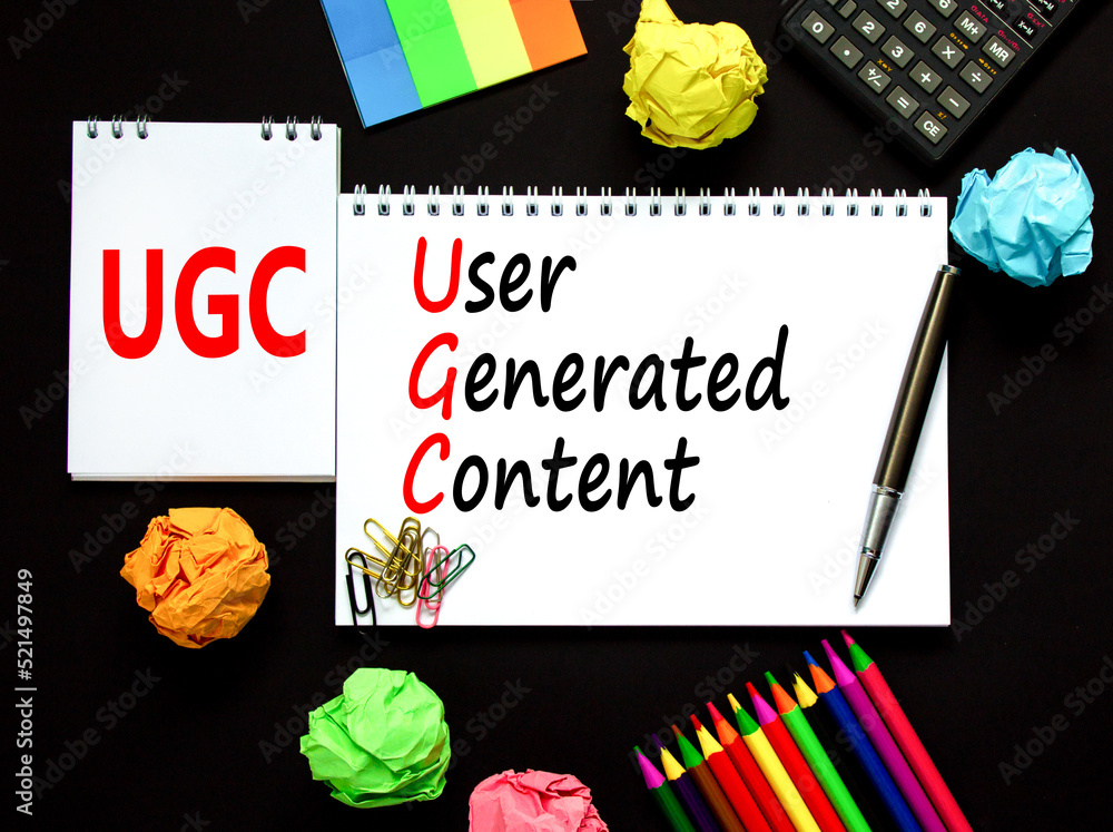 UGC user generated content symbol. Concept words UGC user generated content on white note on ...