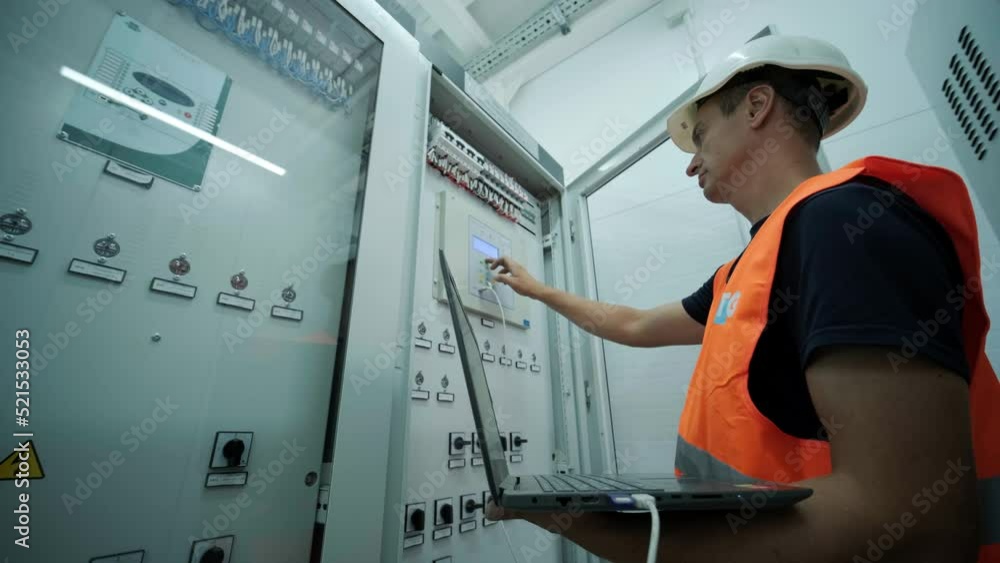 Electrical engineer working check the electric current voltage and ...