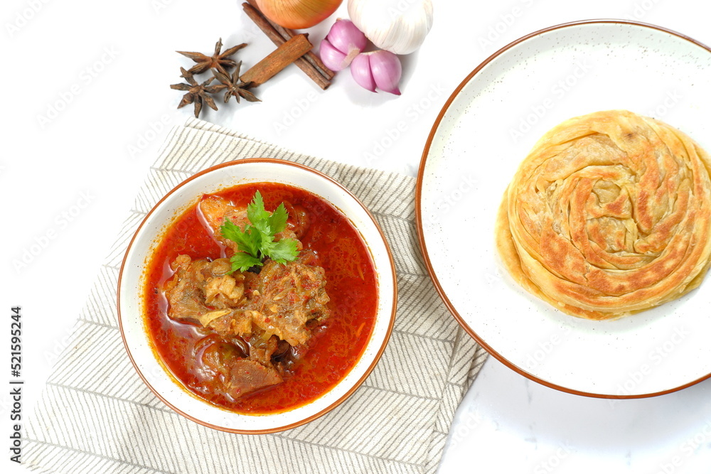 Roti Parata or Roti canai (flat bread ) with mutton curry Stock Photo ...