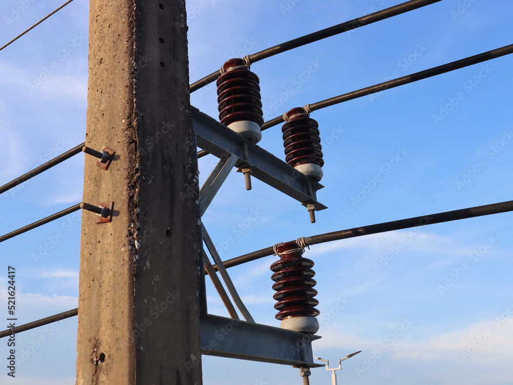 High voltage device on a pole along which electricity flows Stock Photo ...