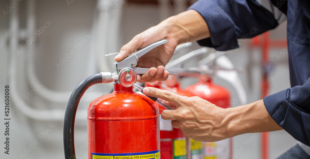 Engineer are checking and inspection a fire extinguishers tank in the ...