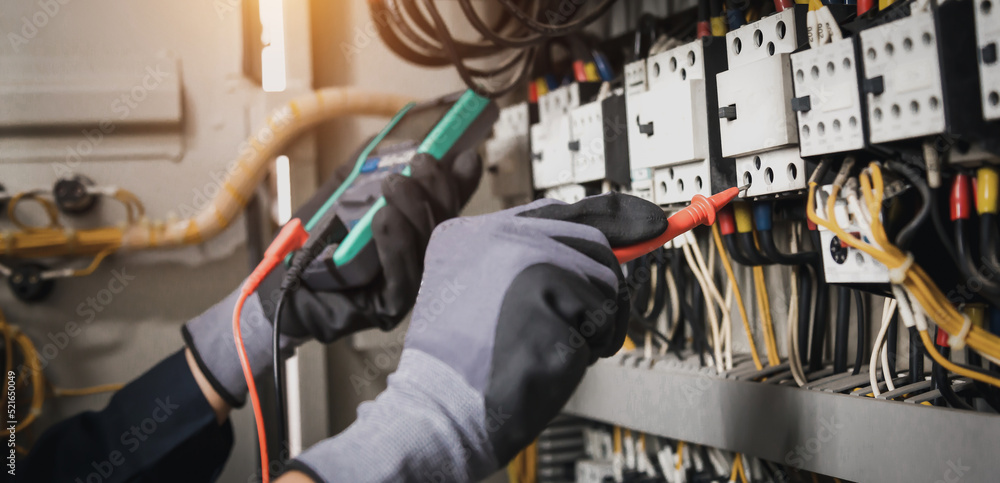 Electricity and electrical maintenance service, Engineer hand holding ...