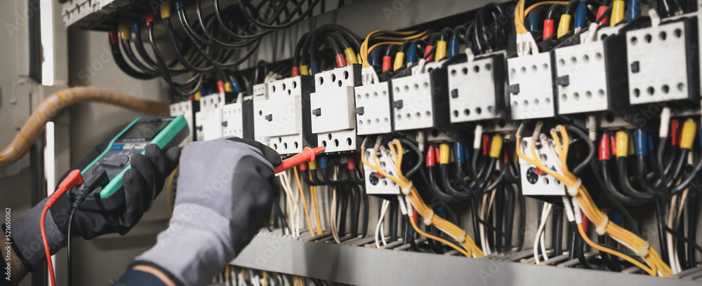 Electricity and electrical maintenance service, Engineer hand holding ...