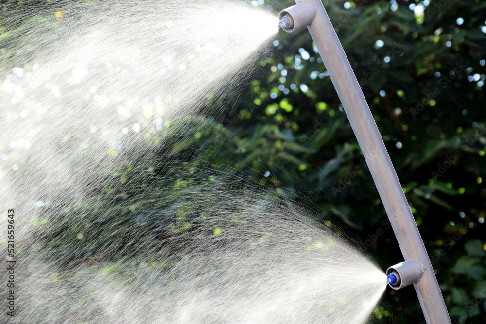 fine water spray or mist nozzle and pipe. restaurant terrace cooling ...