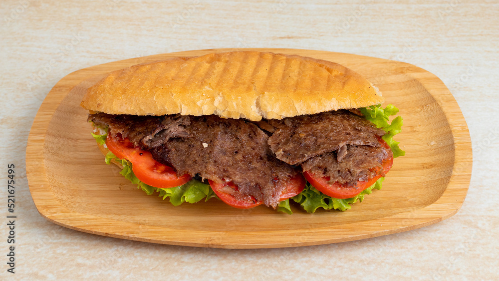 Beef doner kebab on wooden tray top view isolated Stock Photo | Adobe Stock