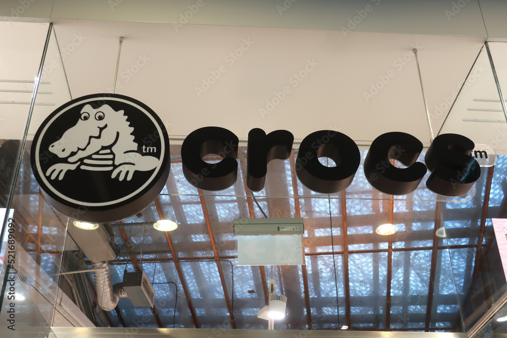 CROCS signage, emblem and logo at the shoes and sandals store. WARSAW ...