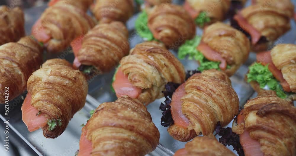 Decorated catering banquet table with variety of different pastry and ...