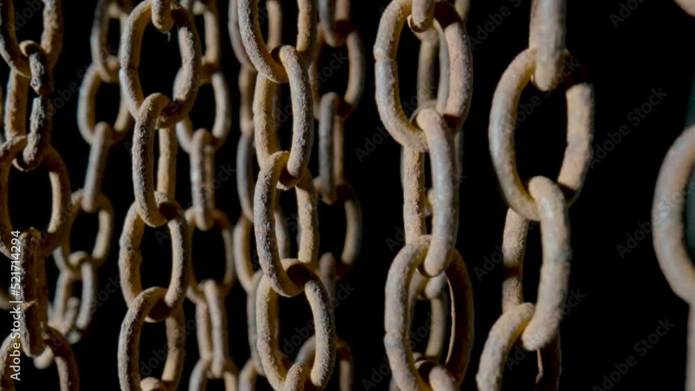 Old metal chain with dark rusted links on black background. Rusty ...