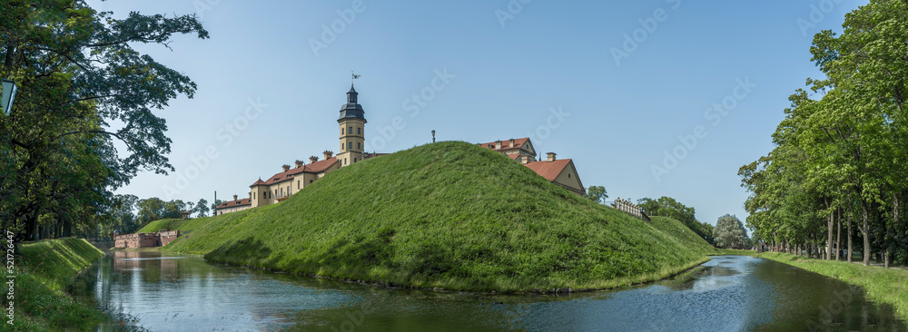 Moat of old castle. Moat with reflection in the water and trees. Sunny ...