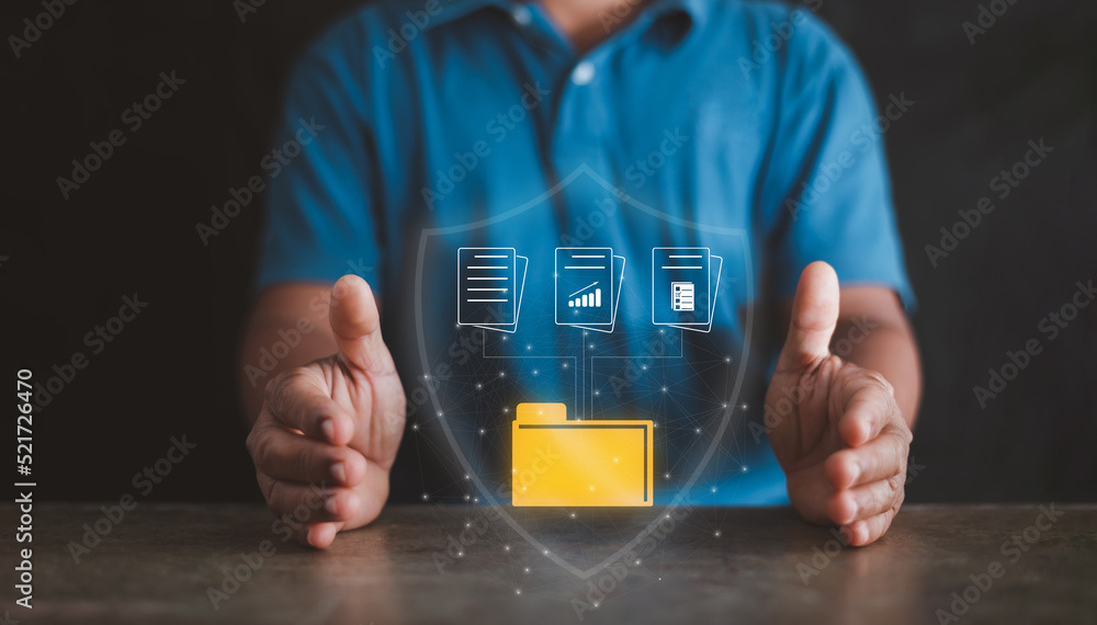 Document security concept, Businessman hands holding shield for protect ...