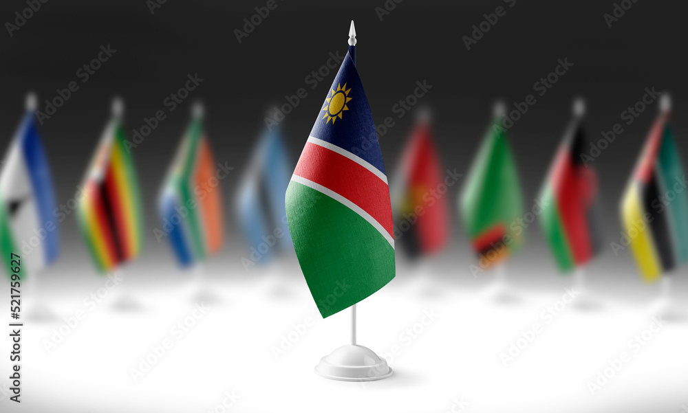 The national flag of the Namibia on the background of flags of other countries Stock Photo ...
